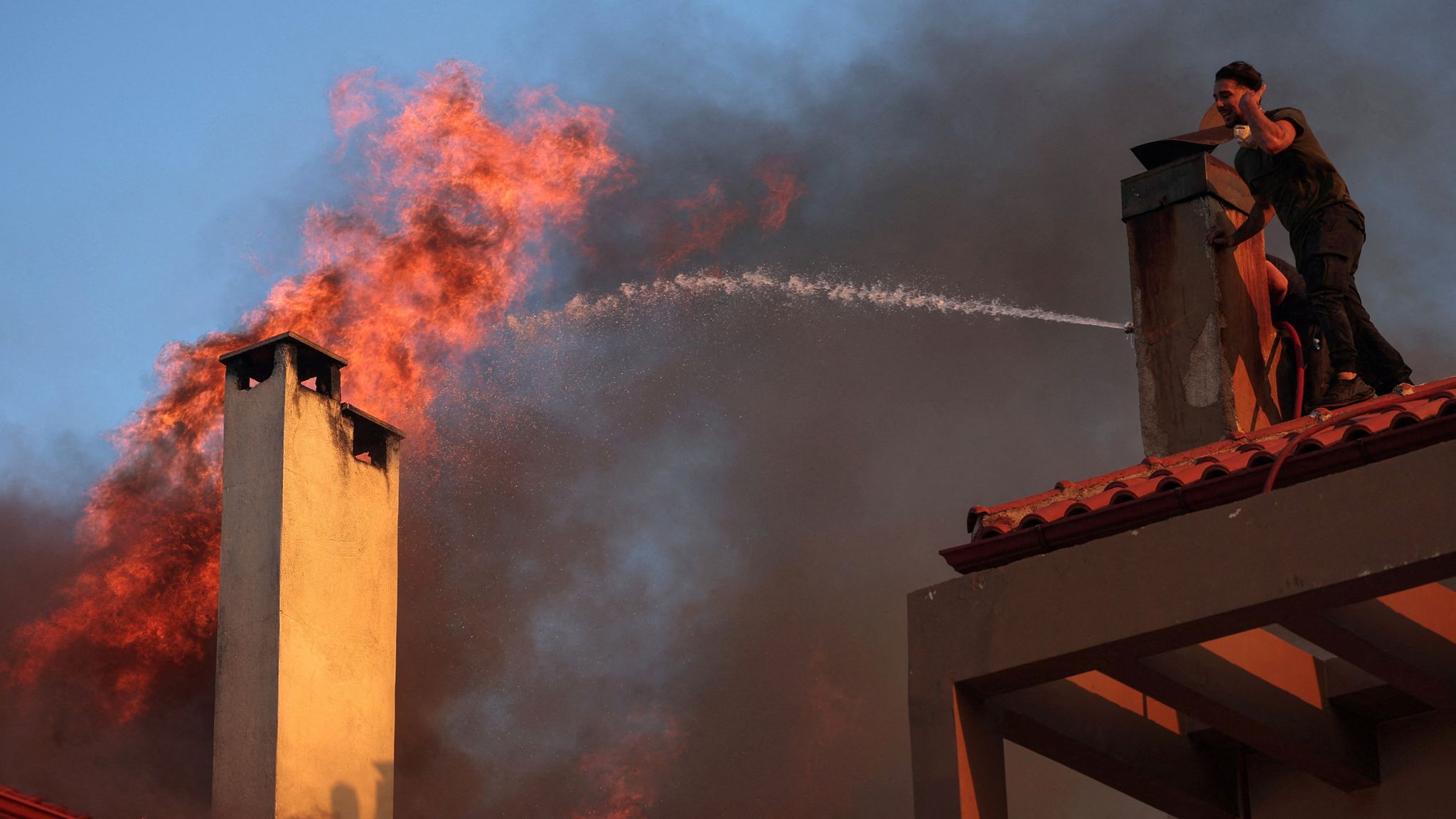 Firefighters tackle blazes as wildfires break out in Greece, Turkey and ...