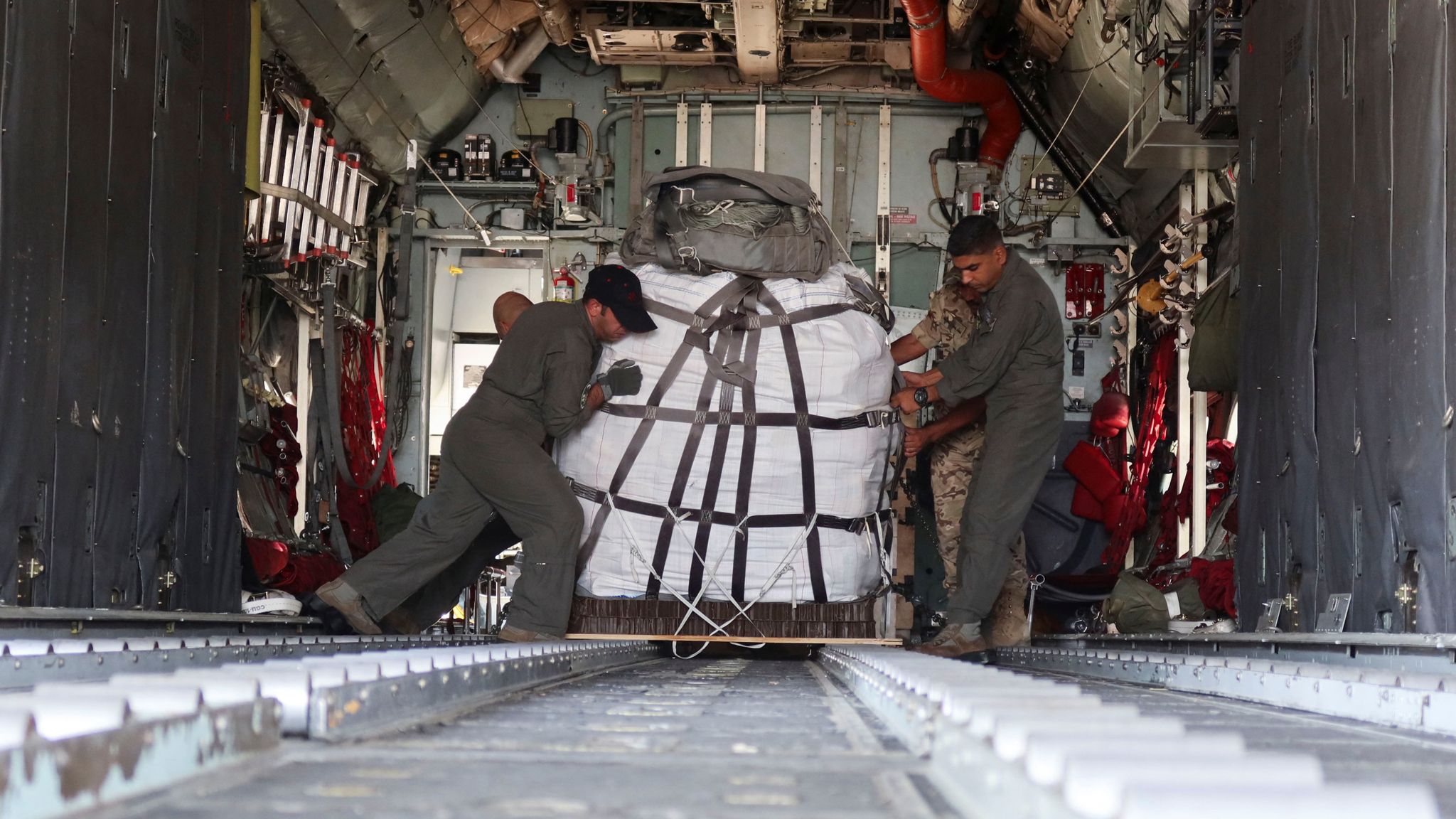 Mile after mile of grey rubble - the view from a plane dropping aid to ...