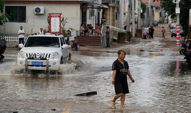 China floods: At least 30 killed in Beijing and 80,000 evacuated ...