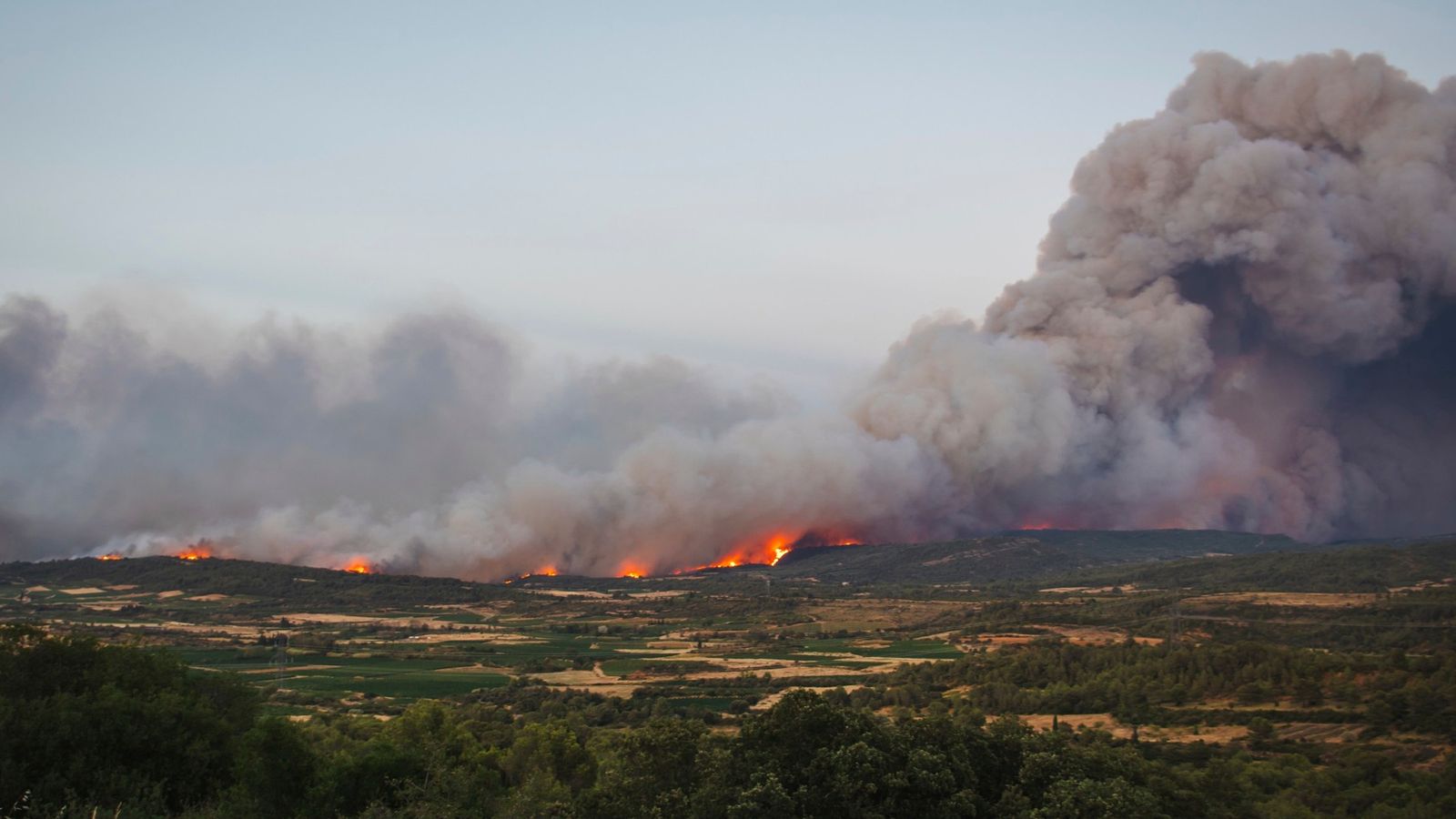 One dead as 'hellish' wildfire burns across area the size of Paris in ...