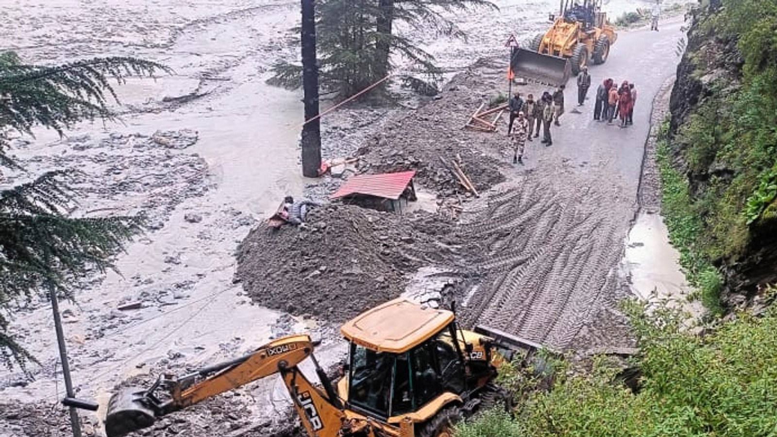 India flash floods: Dozens believed to be trapped under rubble as at ...