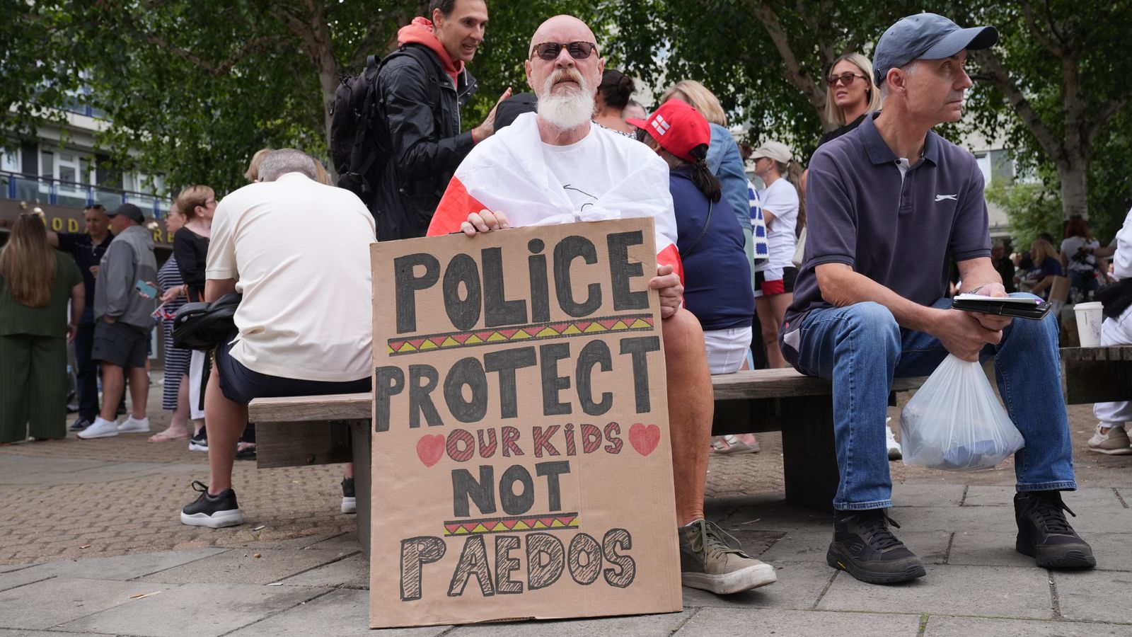 Rival groups face off outside migrant hotel - as asylum seekers 'blow ...