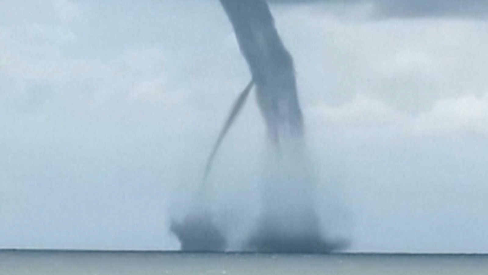Moment twin waterspouts merge off northern Italy’s Po River Delta ...