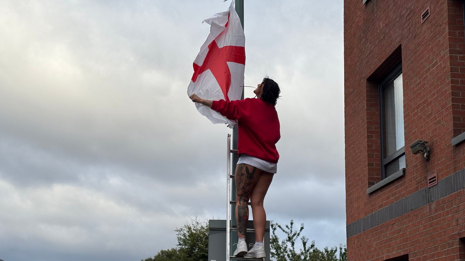 On the streets with England's flag-raisers - as one claims link to ...