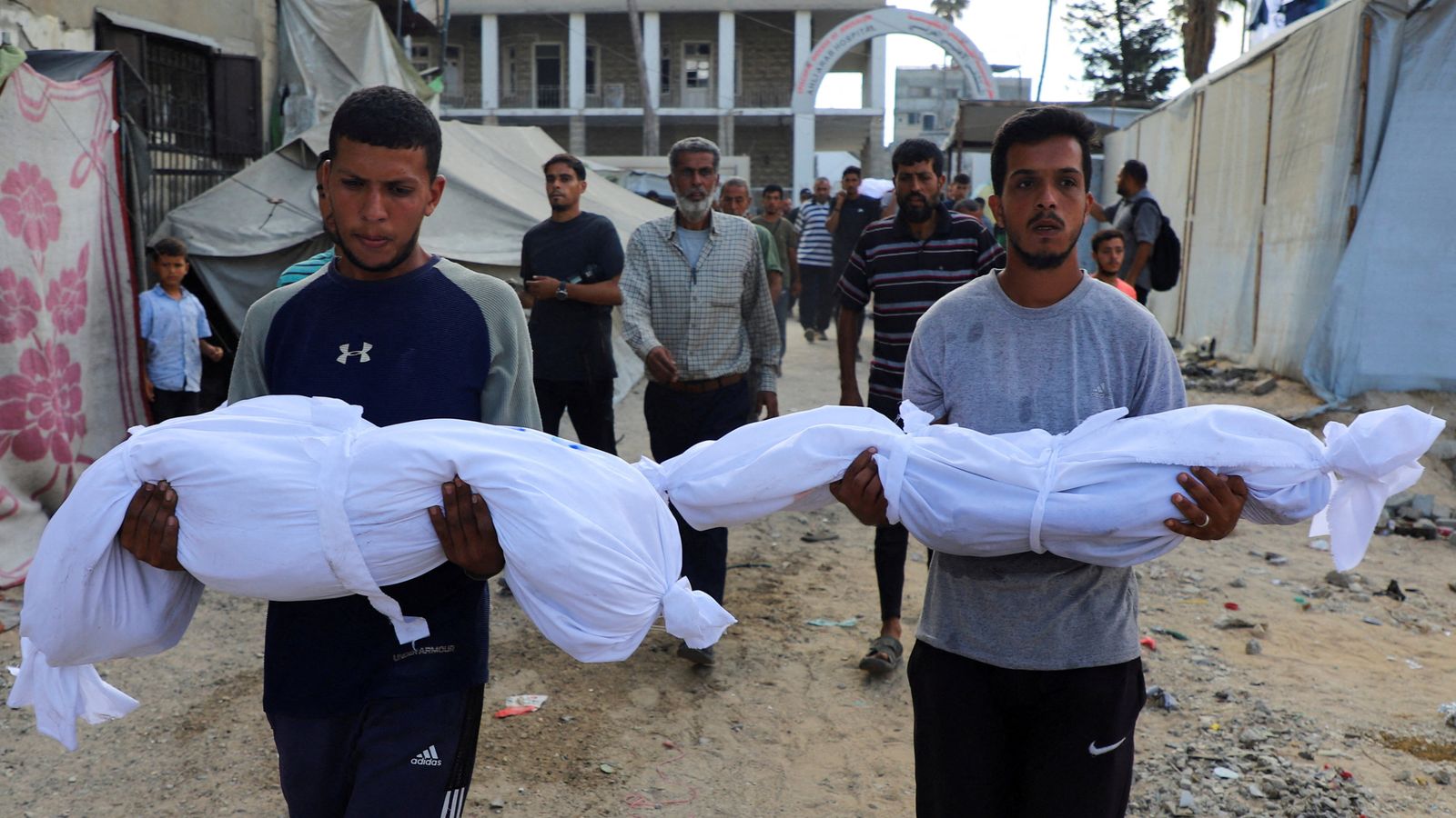 Israel kills 22 people including nine children in 'horrific massacre ...
