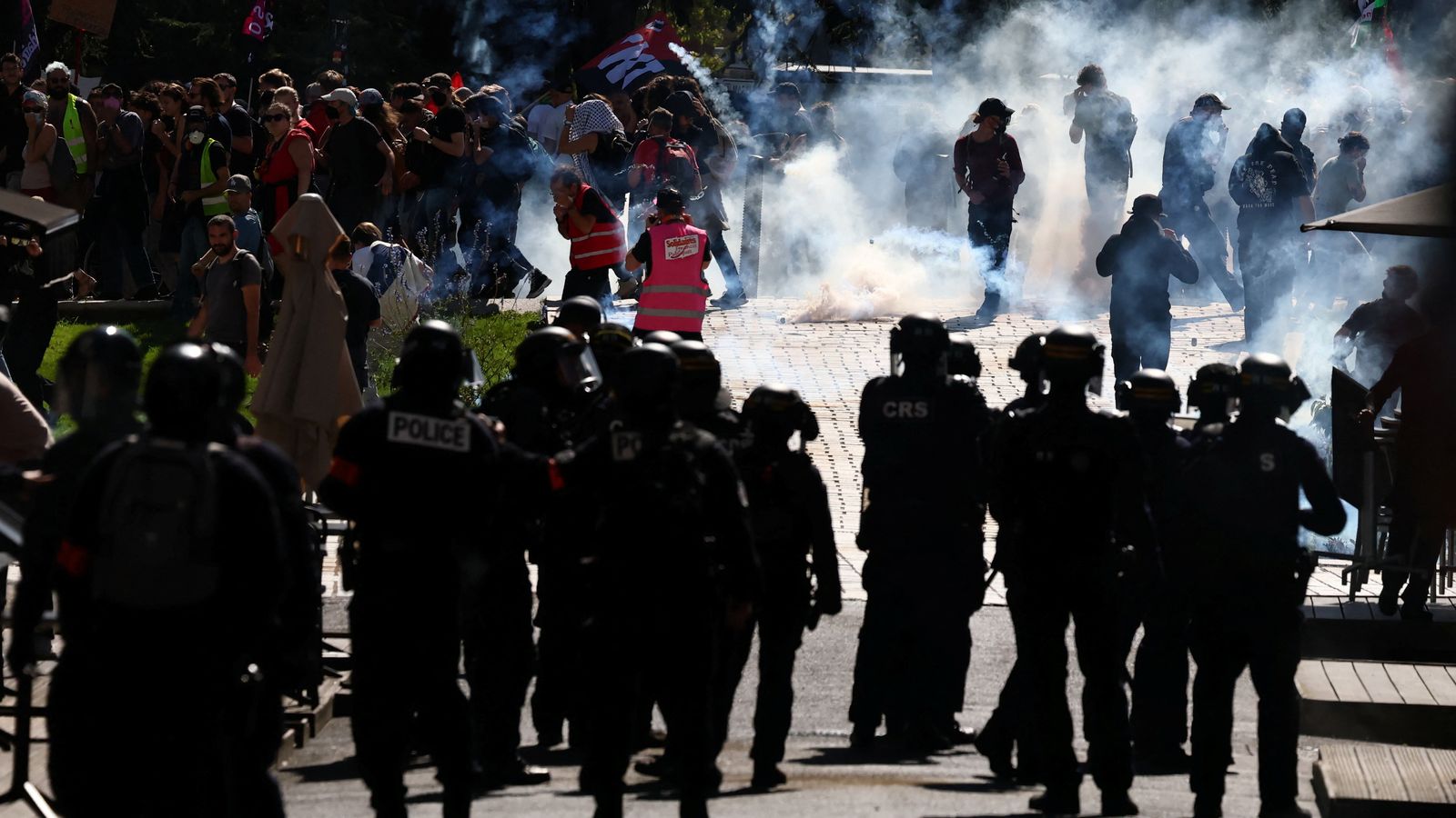 Police fire tear gas at protesters during day of strikes in France ...