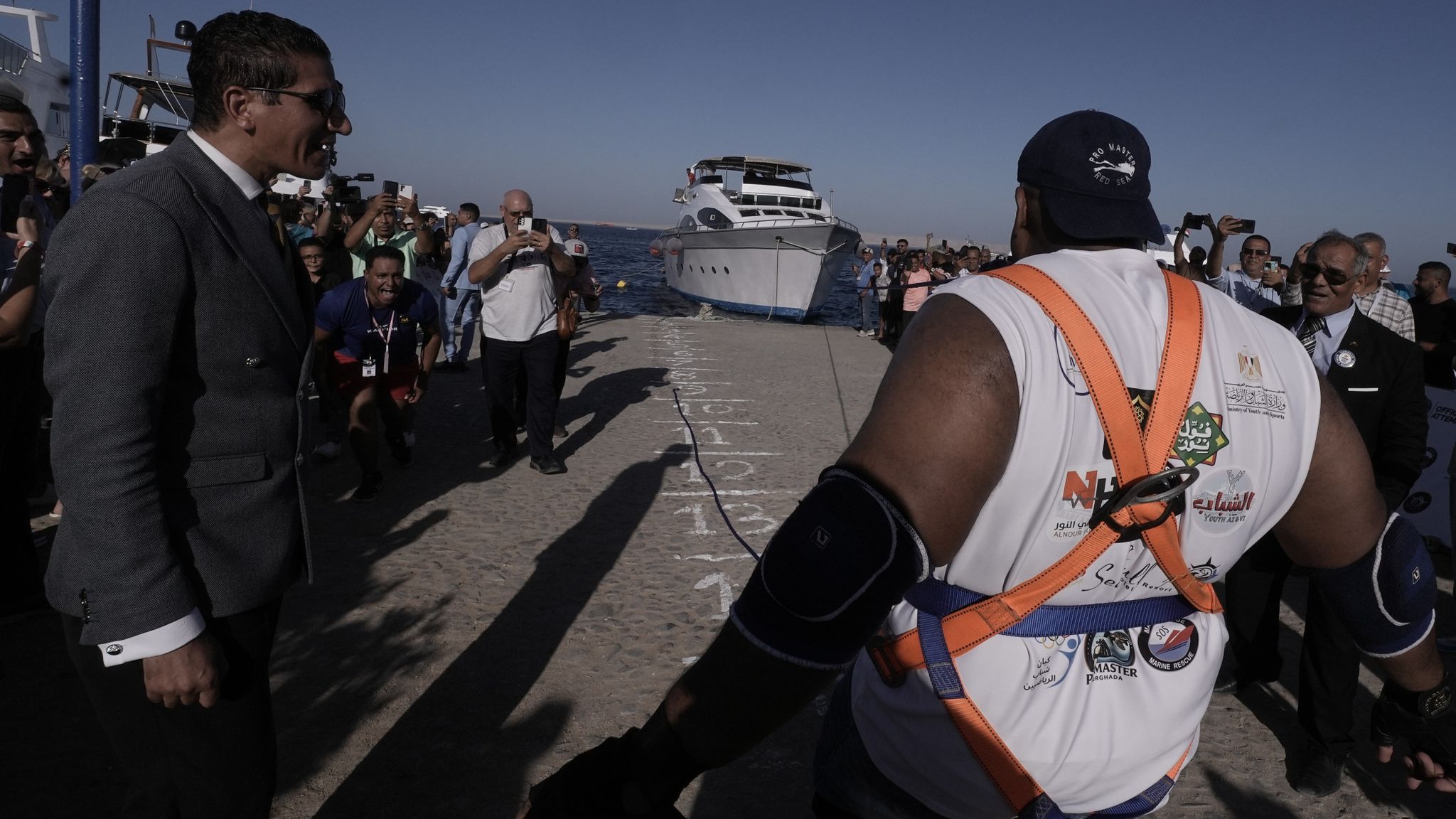 Ashraf Mahrous: Egypt's 'strongman' wrestler pulls ship using his teeth ...