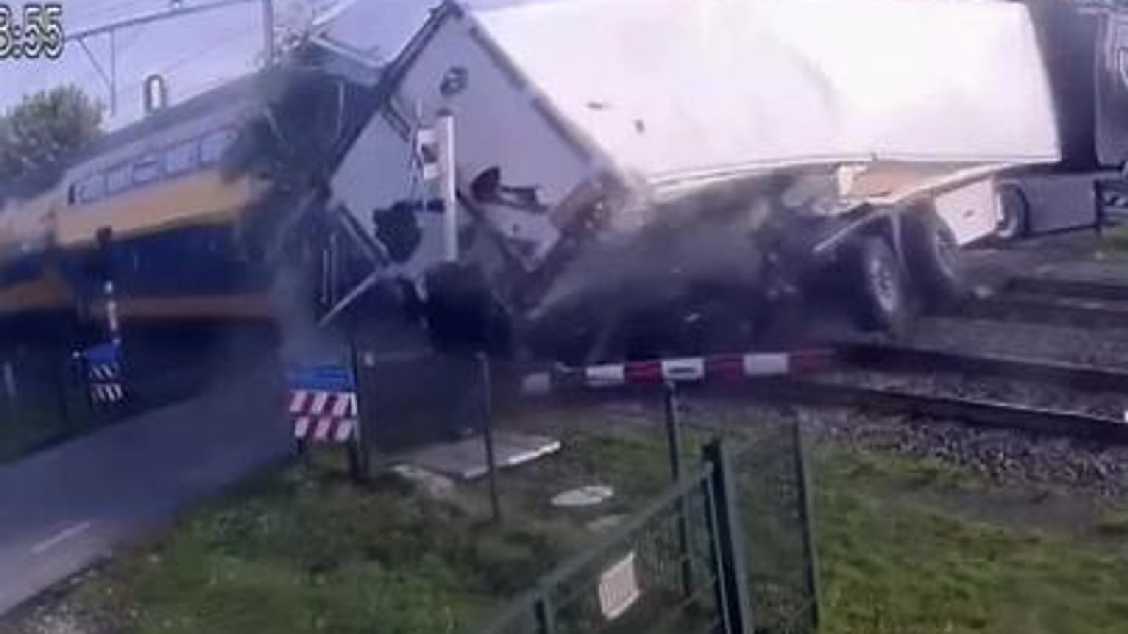 Moment train smashes into truck full of pears at crossing in the ...