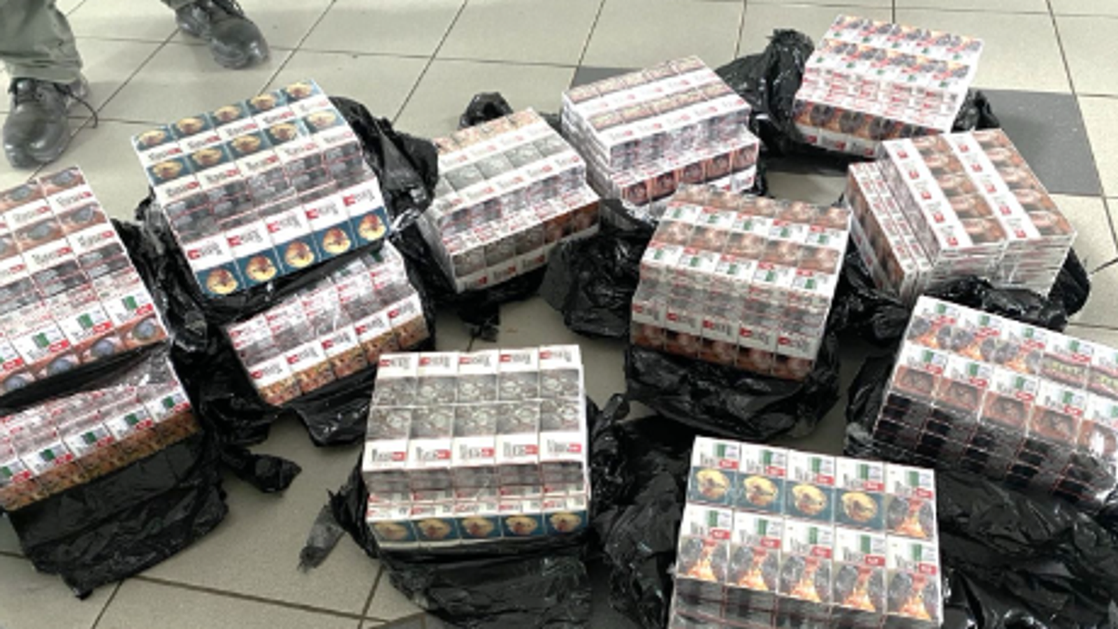 Airport halts flights after balloons used by cigarette smugglers breach ...