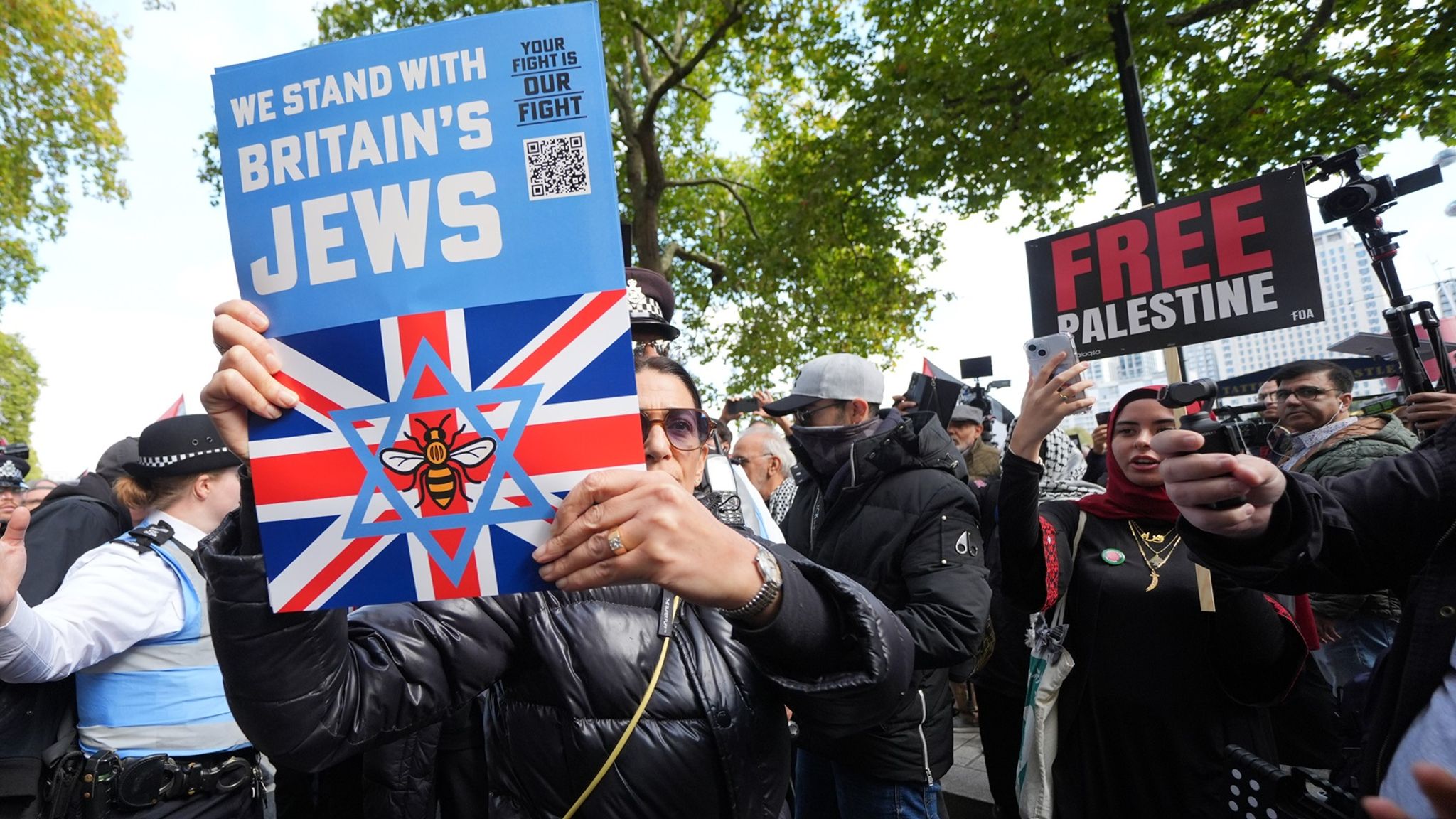 Police use Public Order Act to keep rival protesters apart at London ...