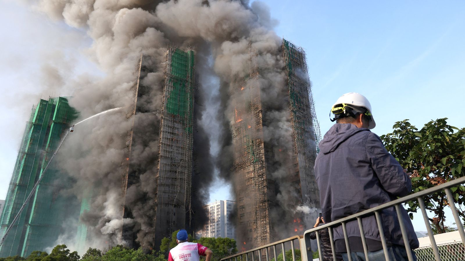 Almost 280 people missing as huge fire engulfs Hong Kong flats - dozens ...