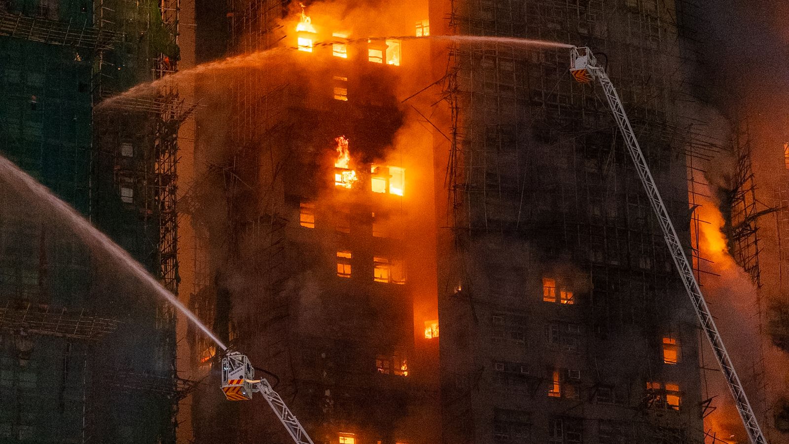 Almost 280 people missing as huge fire engulfs Hong Kong flats - dozens ...