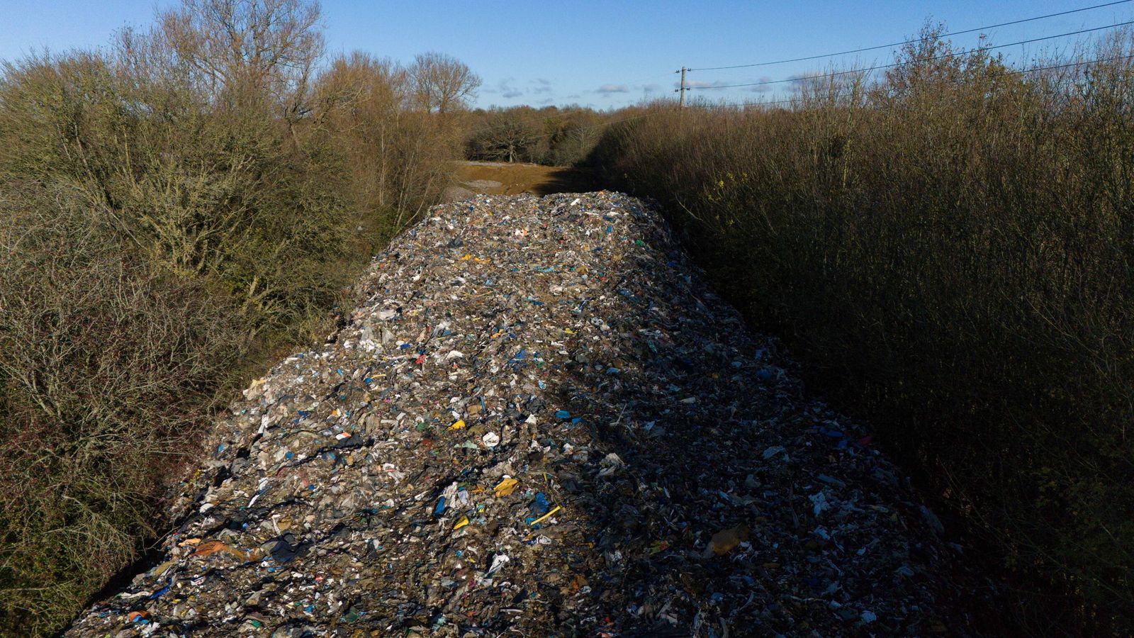 Man arrested in connection with massive illegal waste dump in ...