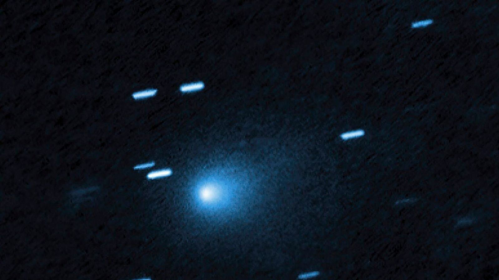 NASA shares new pictures of interstellar comet that zoomed past Mars ...