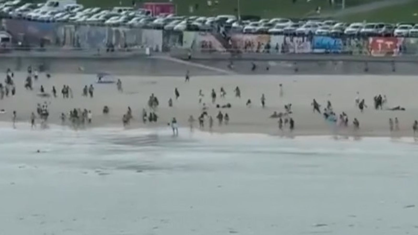 Moment people run for cover on Bondi Beach | News UK Video News | Sky News