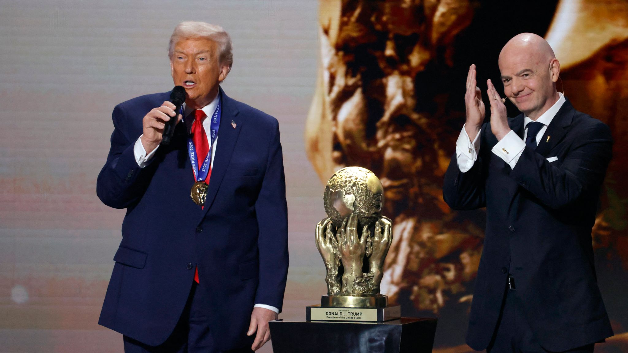 Donald Trump awarded FIFA peace prize at World Cup draw | World News ...