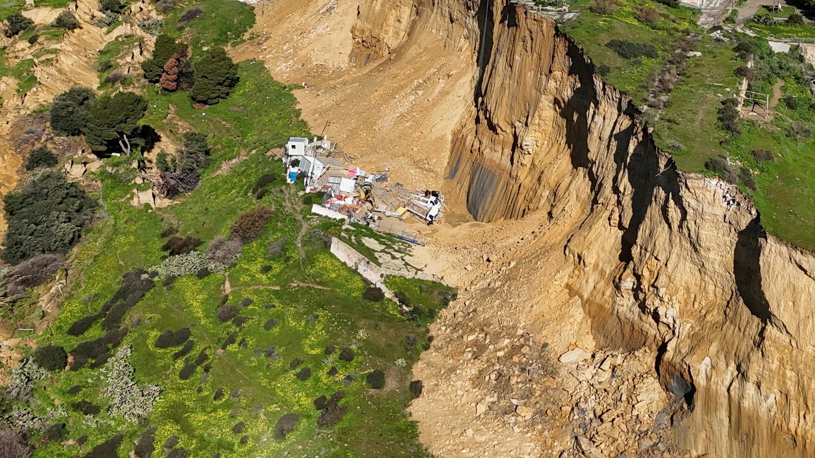 'The entire hill is collapsing': Landslide in Sicily causes homes to ...