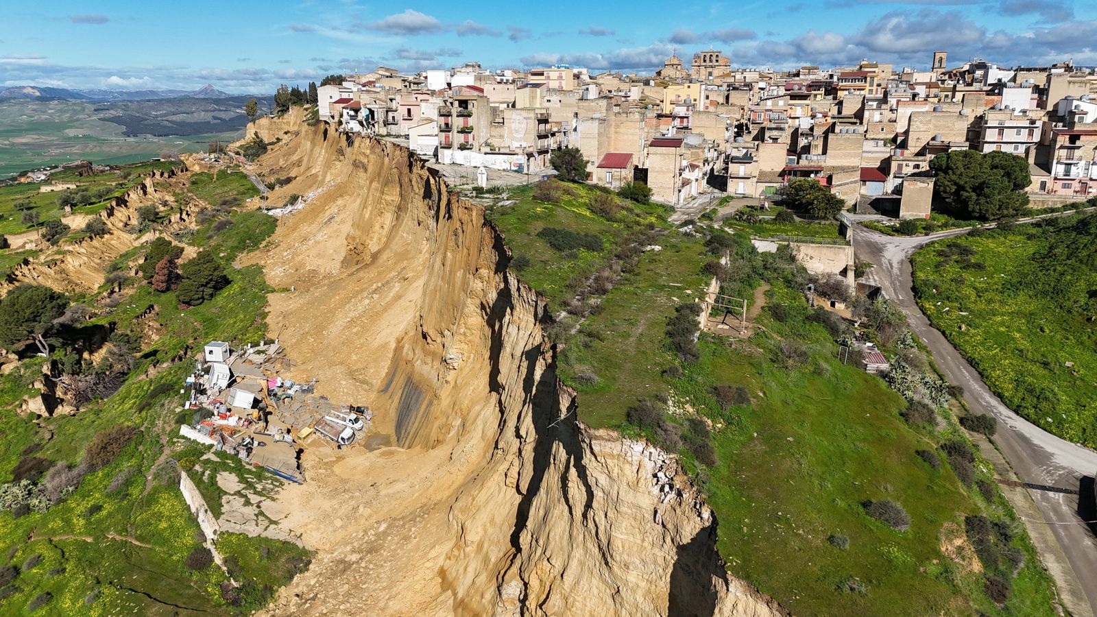 'The entire hill is collapsing': Landslide in Sicily causes homes to ...