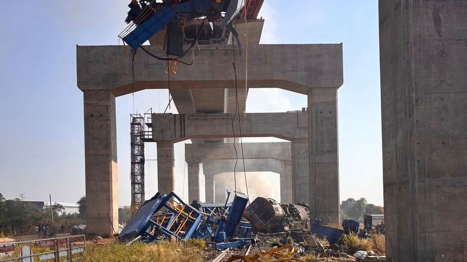 Rescue efforts after crane falls on top of train in Thailand | World ...