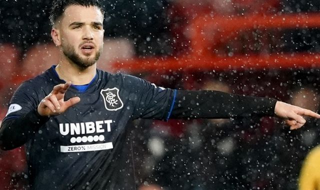 Nico Raskin: Rangers midfielder appears to squirt water at fan after ...