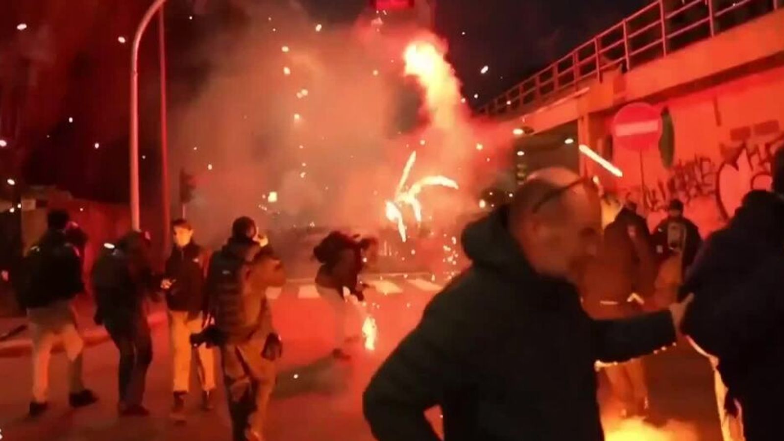 Tear gas fired at protesters with fireworks at Winter Olympics in Italy ...