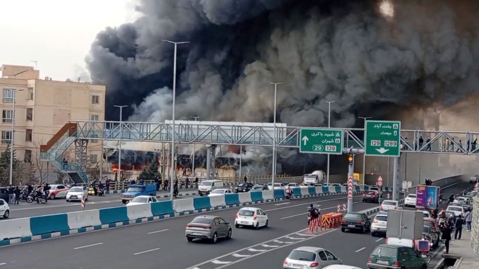 Black smoke from Tehran fire spreads across busy roads in the Iranian ...