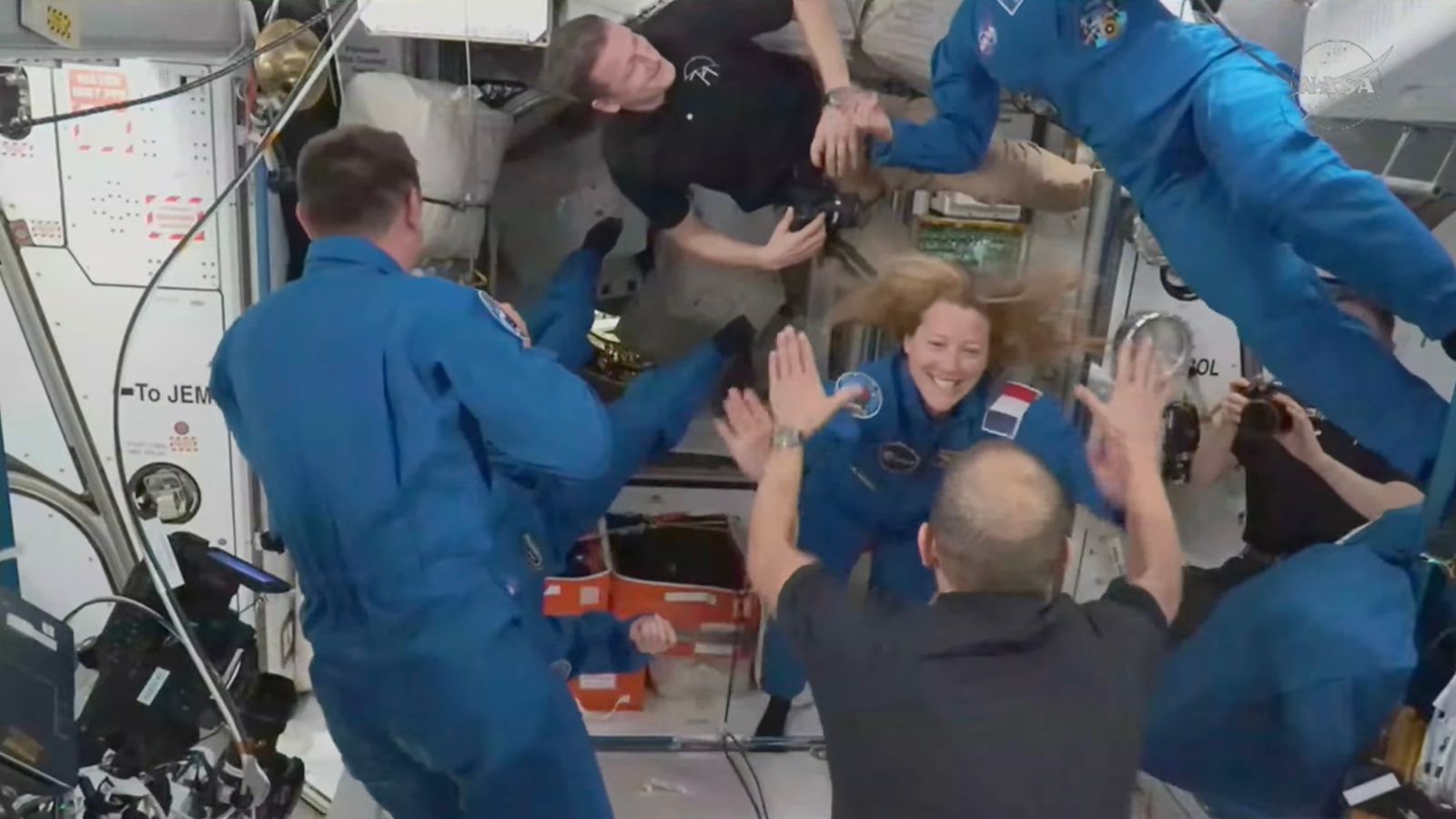 Four new astronauts arrive at the International Space Station to ...