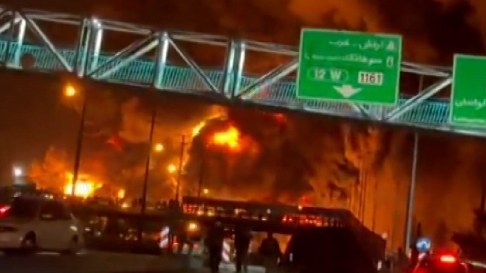Huge fire after Israel strikes Iran oil depot | World News | Sky News