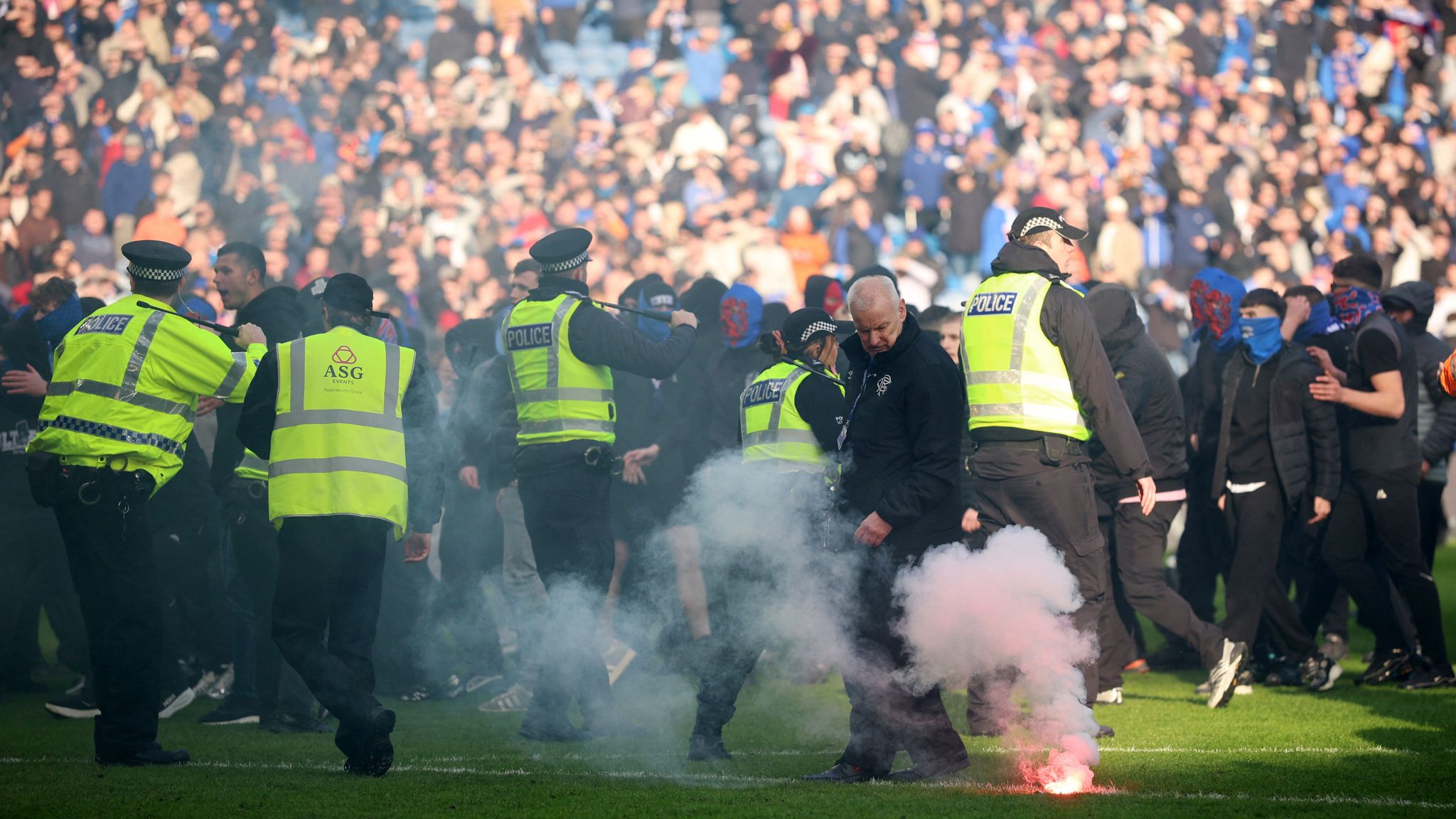 Rangers and Celtic fans in 'shameful' clashes on pitch after Scottish ...