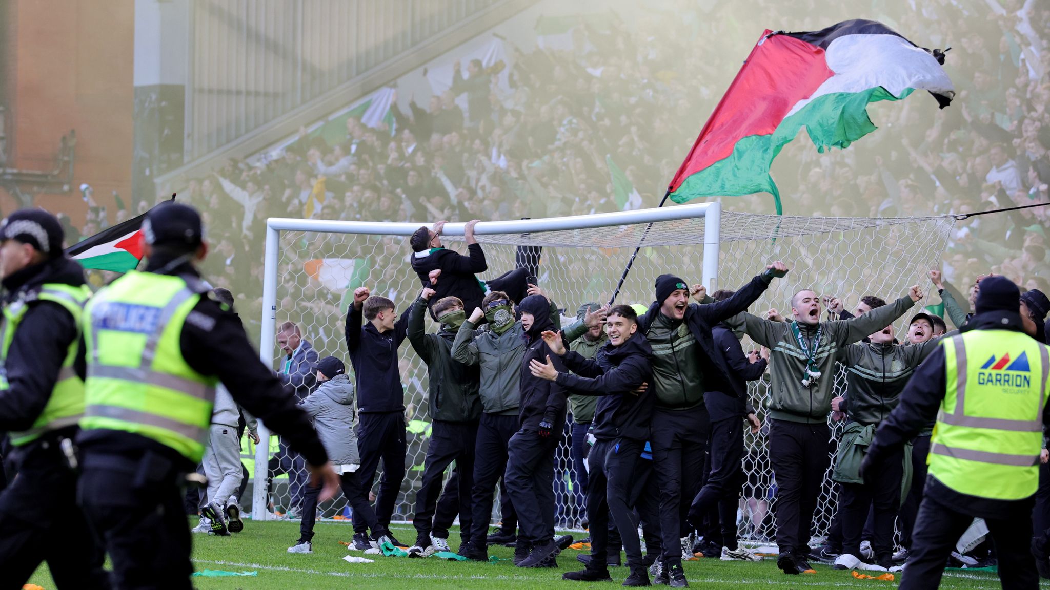 Rangers and Celtic fans in 'shameful' clashes on pitch after Scottish ...