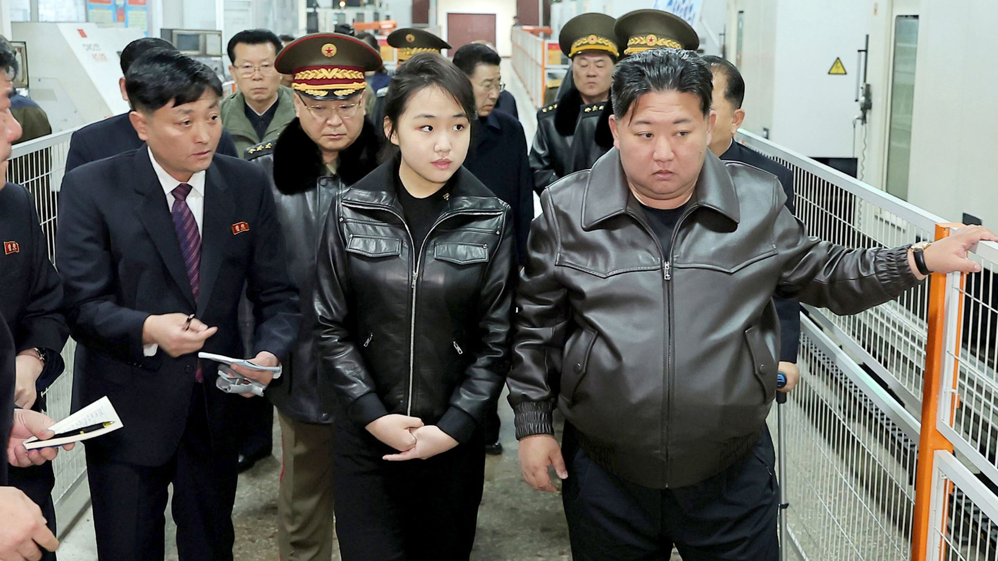 Kim Jong Un and teenage daughter fire guns as North Korea debuts new ...