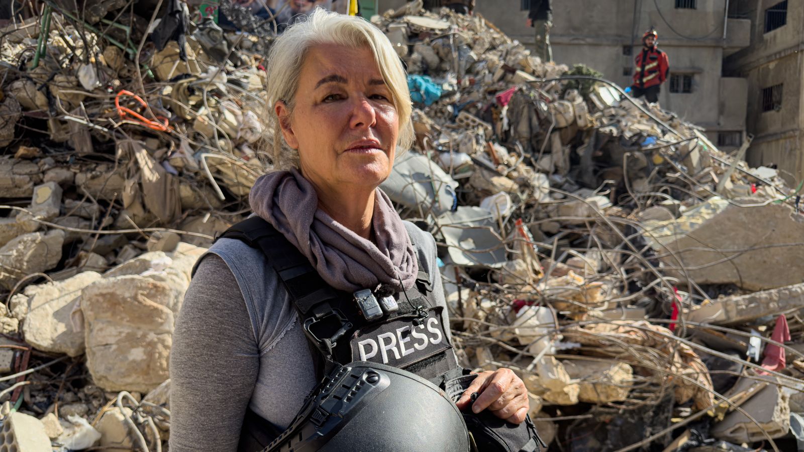 Alex Crawford walks through ruins of house in southern Beirut where a ...