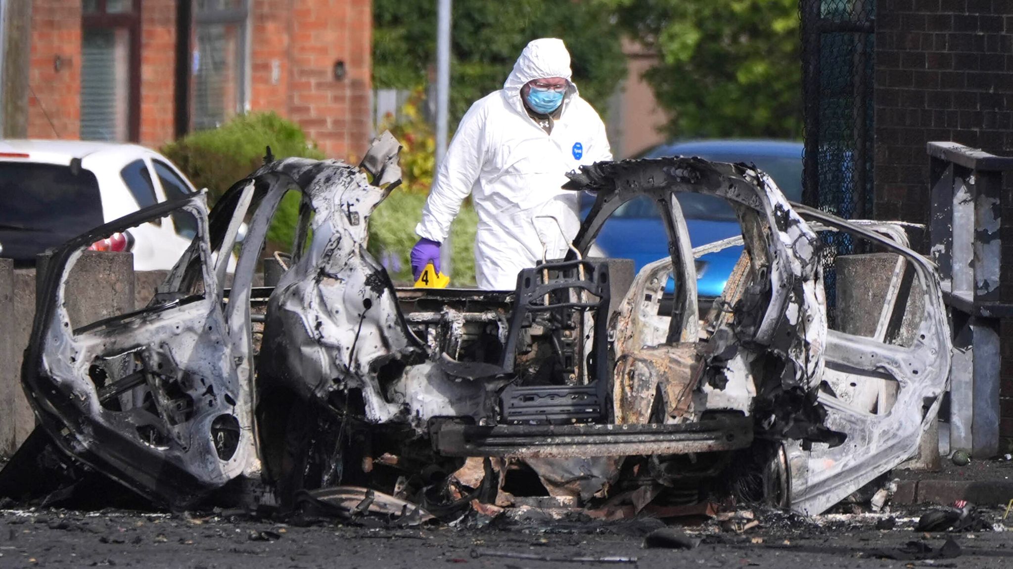 Babies among residents rushed to safety as car bomb explodes next to ...