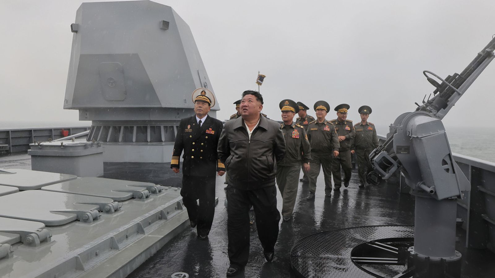 North Korea's Kim Jong Un and daughter eat with crew on new warship ...
