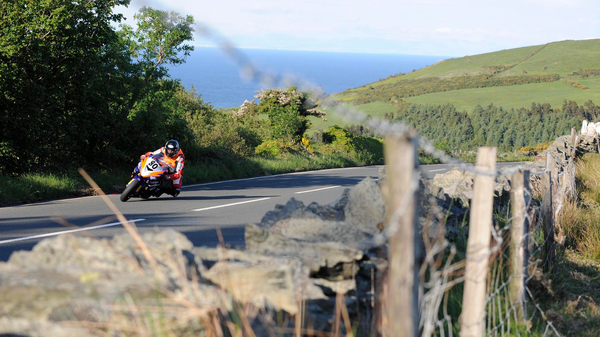 Eight spectators and rider taken to hospital after crash at Isle of Man ...
