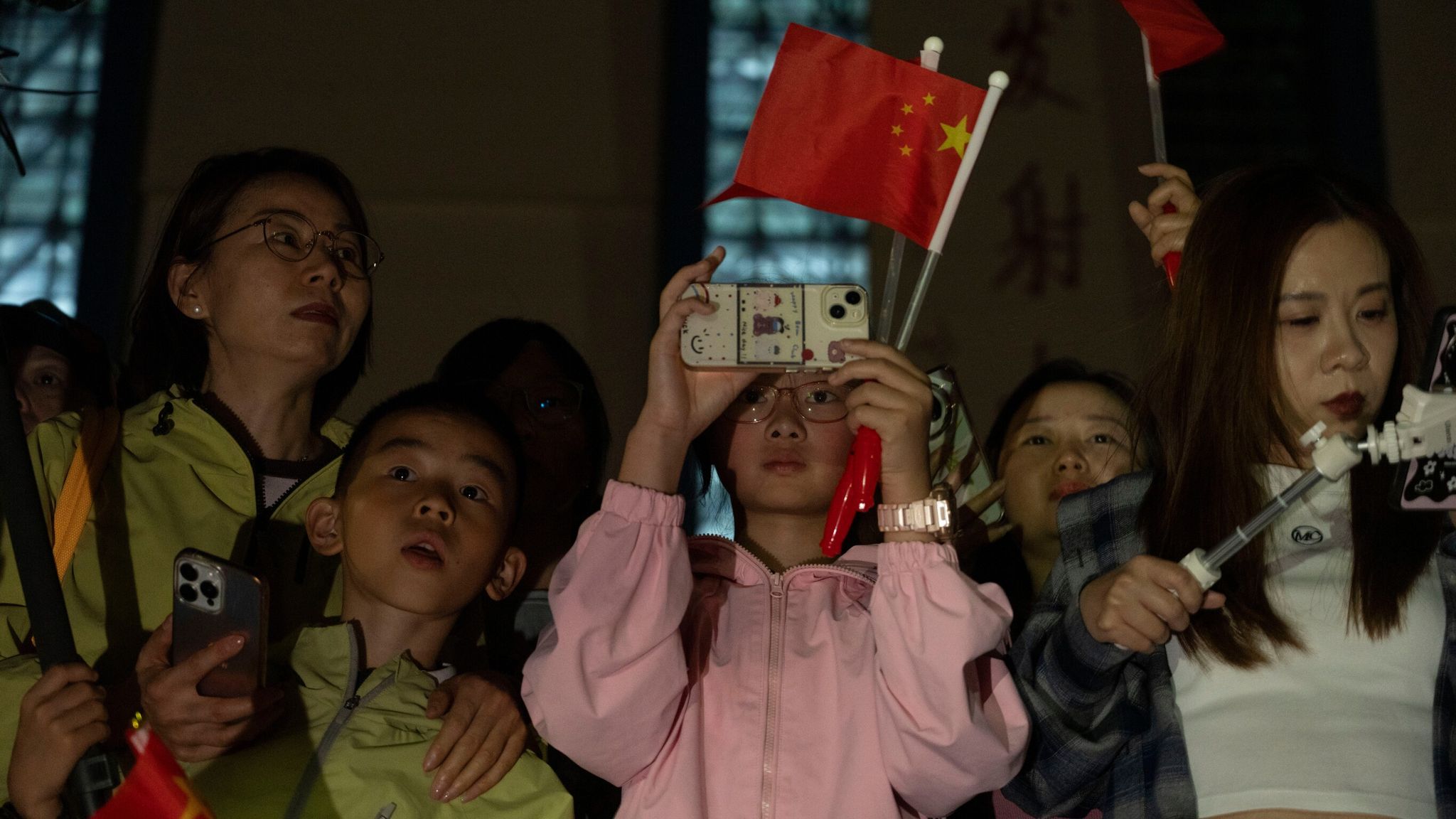 China launches three-astronaut rocket into space as new lunar race ...