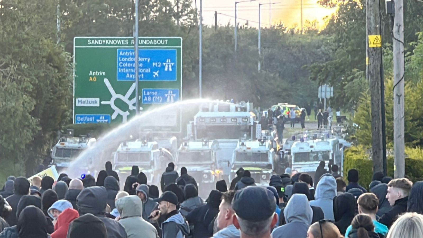Sky News reports from Belfast as police use water cannon on protesters ...