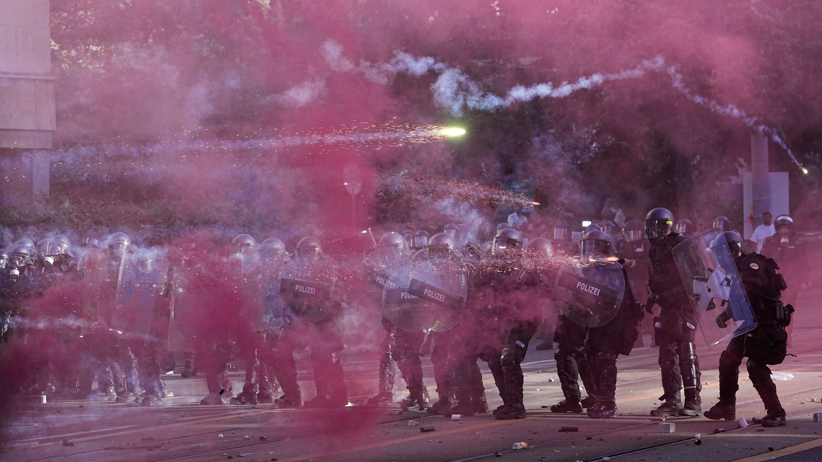 Protesters clash with police in Geneva ahead of G7 summit in France ...